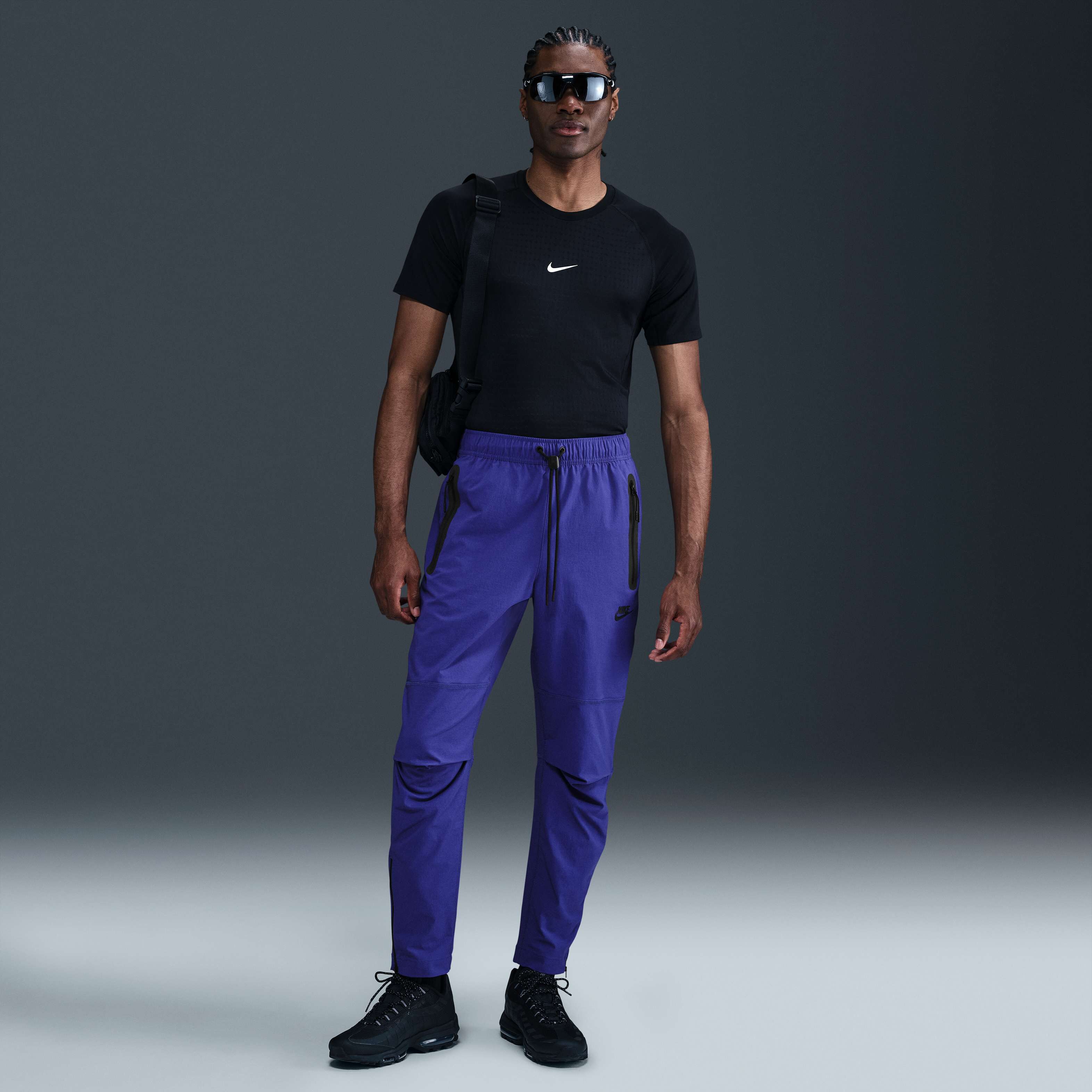Buy Nike Tech Men's Woven Trousers - Deep Night/Black @ Nike UAE