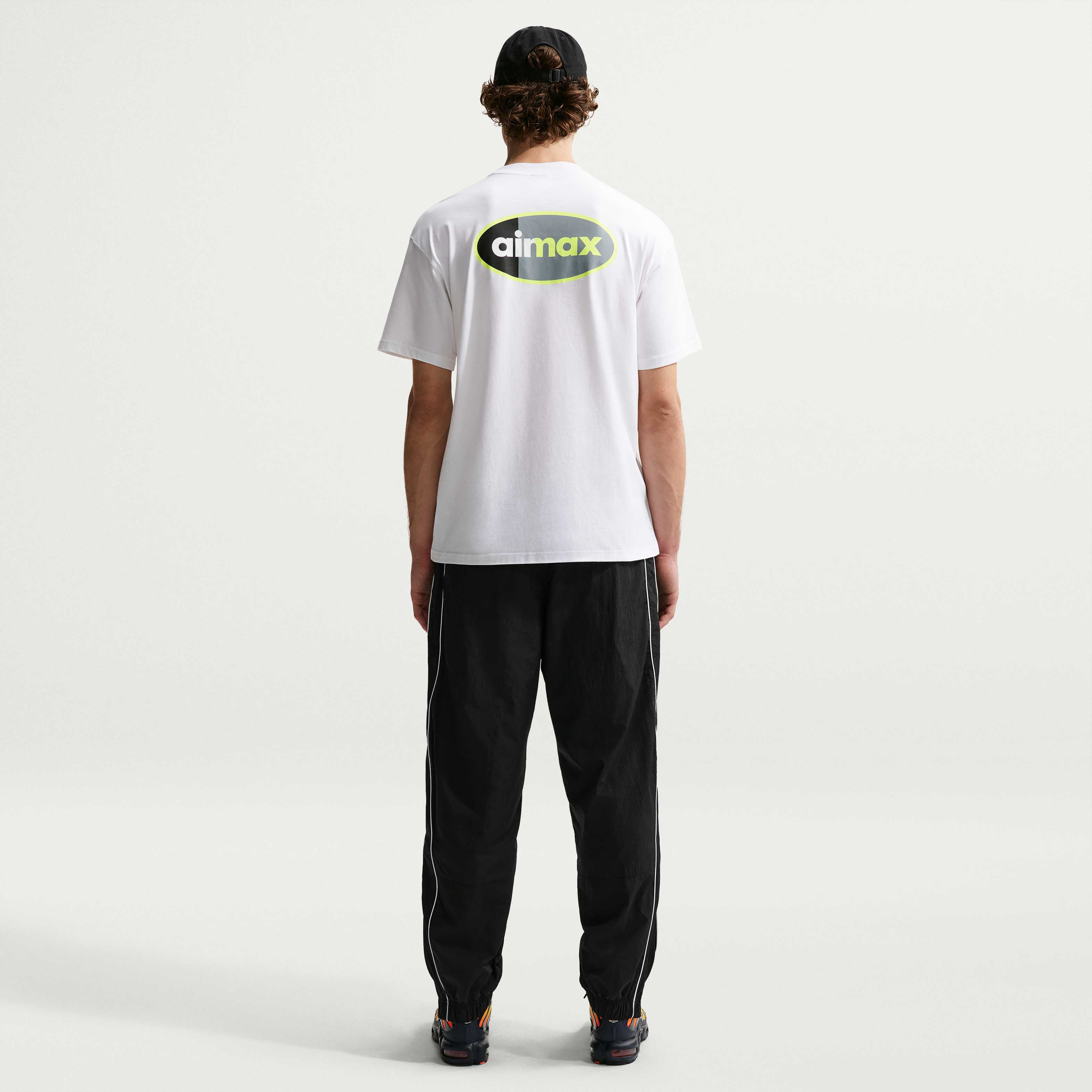 Buy Nike Sportswear Men's Woven Pants - Black/Black/Black @ Nike UAE