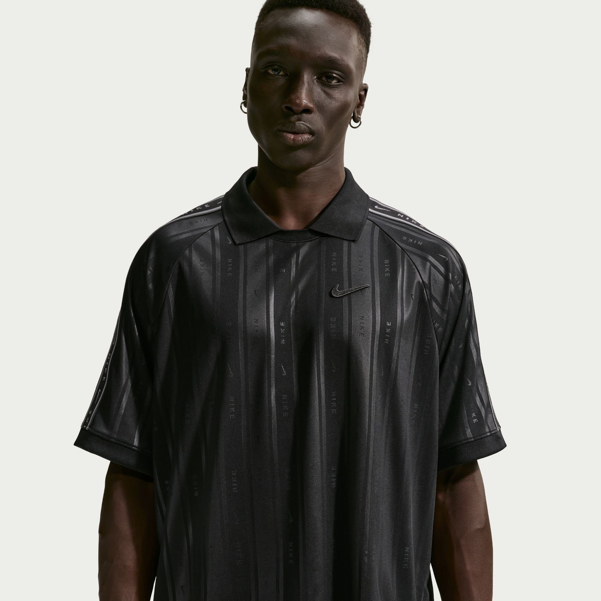 Buy Nike Sportswear City Side Men's Top - Black/Black @ Nike UAE