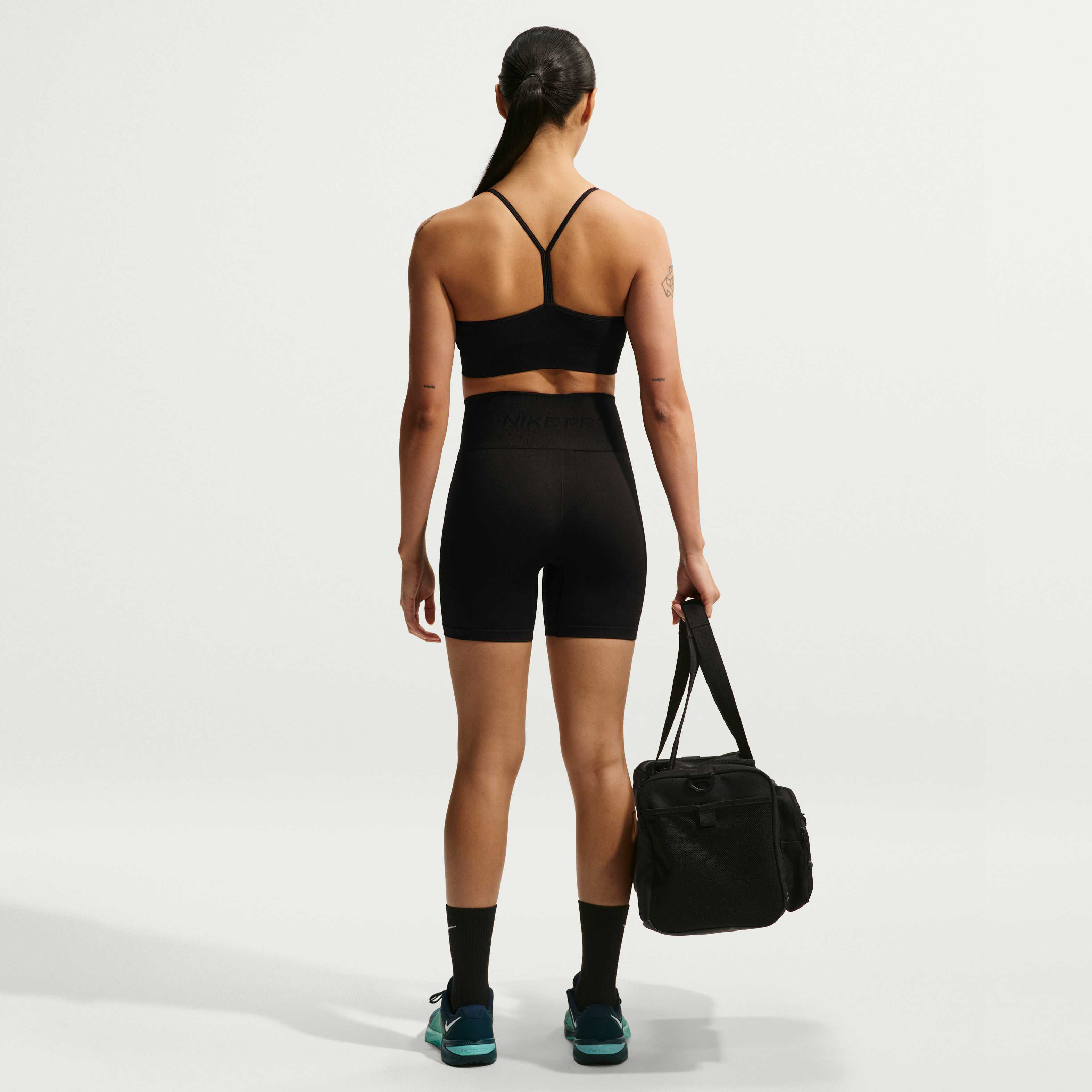 Buy Nike Pro Seamless Women's Light-Support Padded Sports Bra - Black ...
