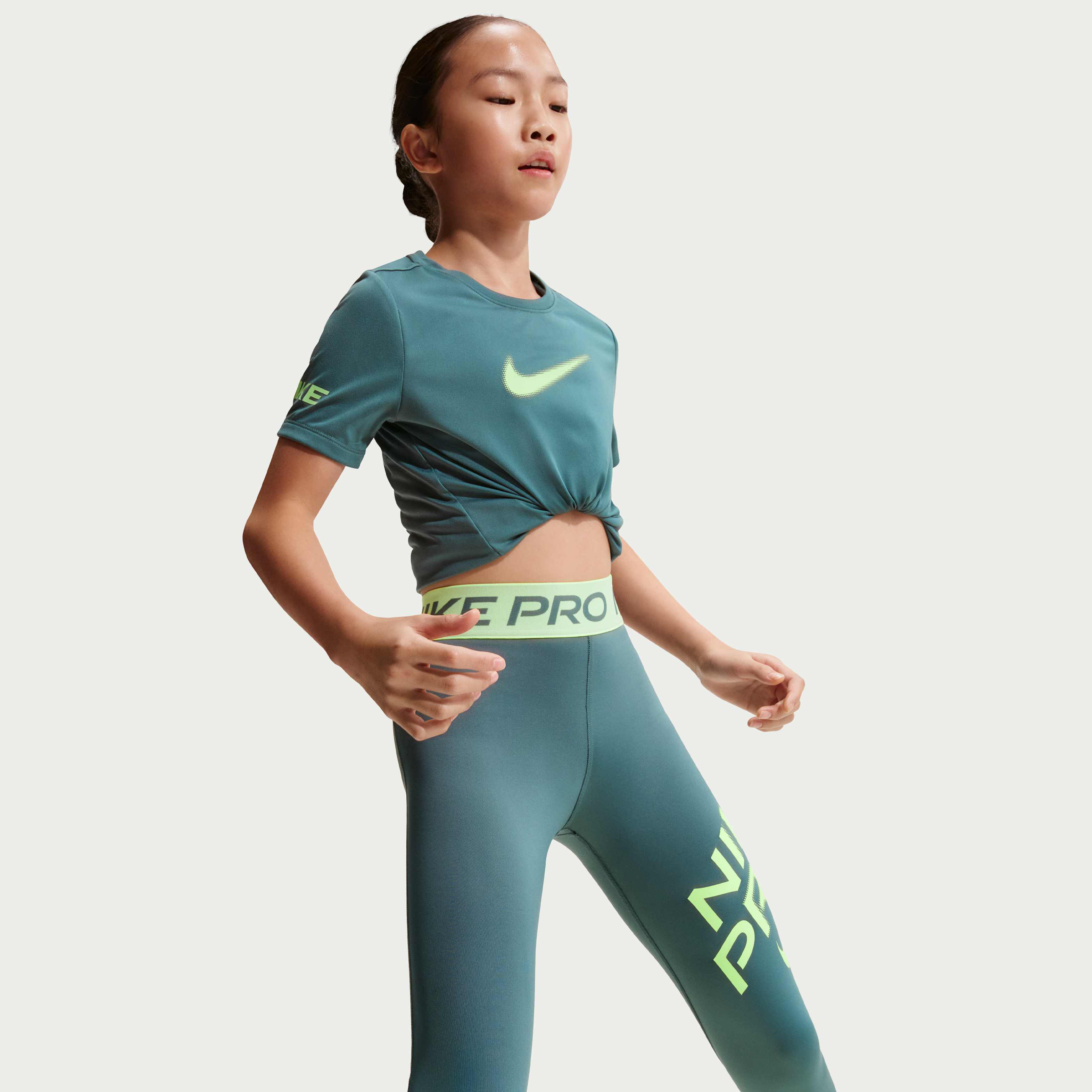 Buy Nike Pro Older Kids' (Girls') Dri-FIT Short-Sleeve Training Top ...