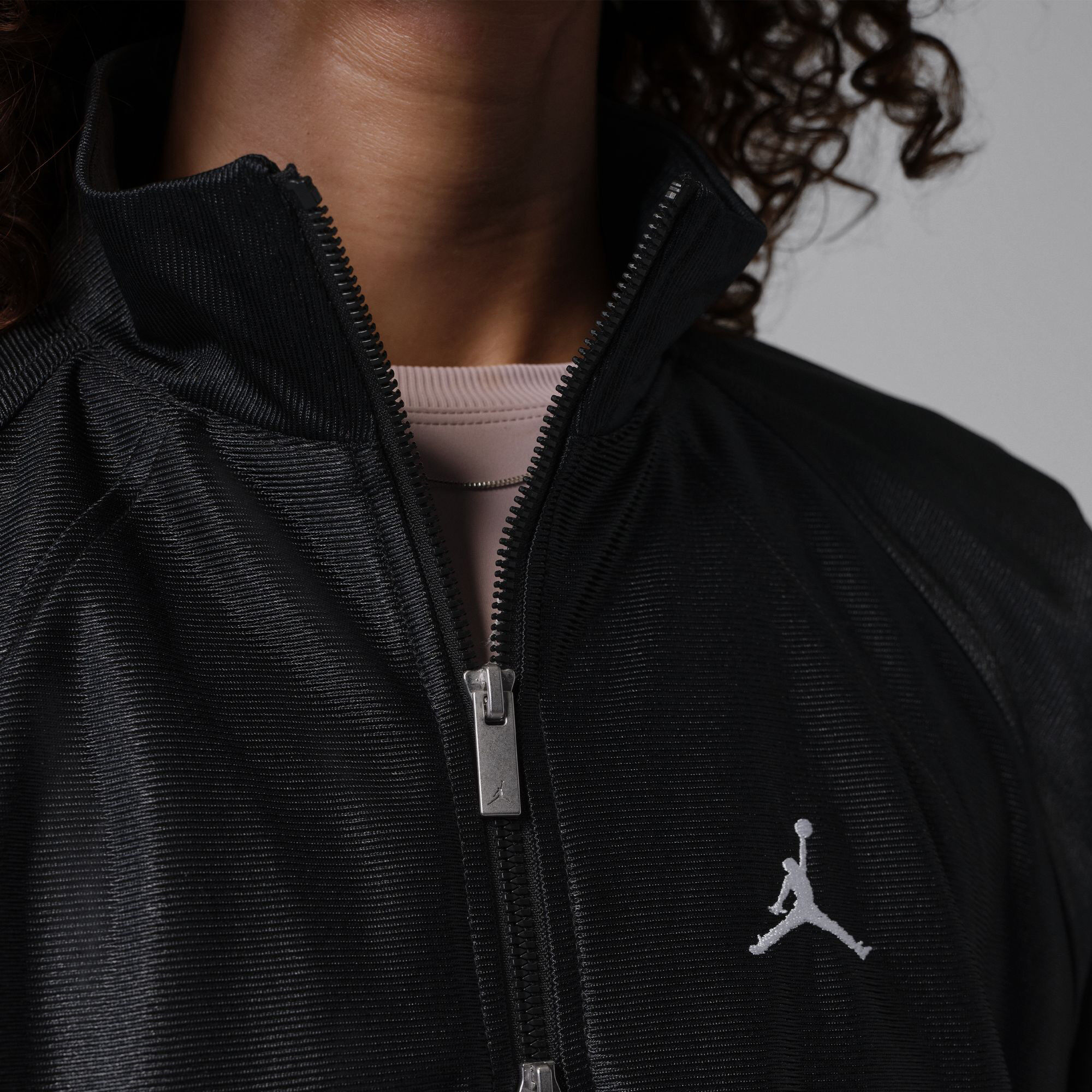 Buy Jordan Brooklyn Women's DuraSheen Track Jacket - Black/White @ Nike UAE