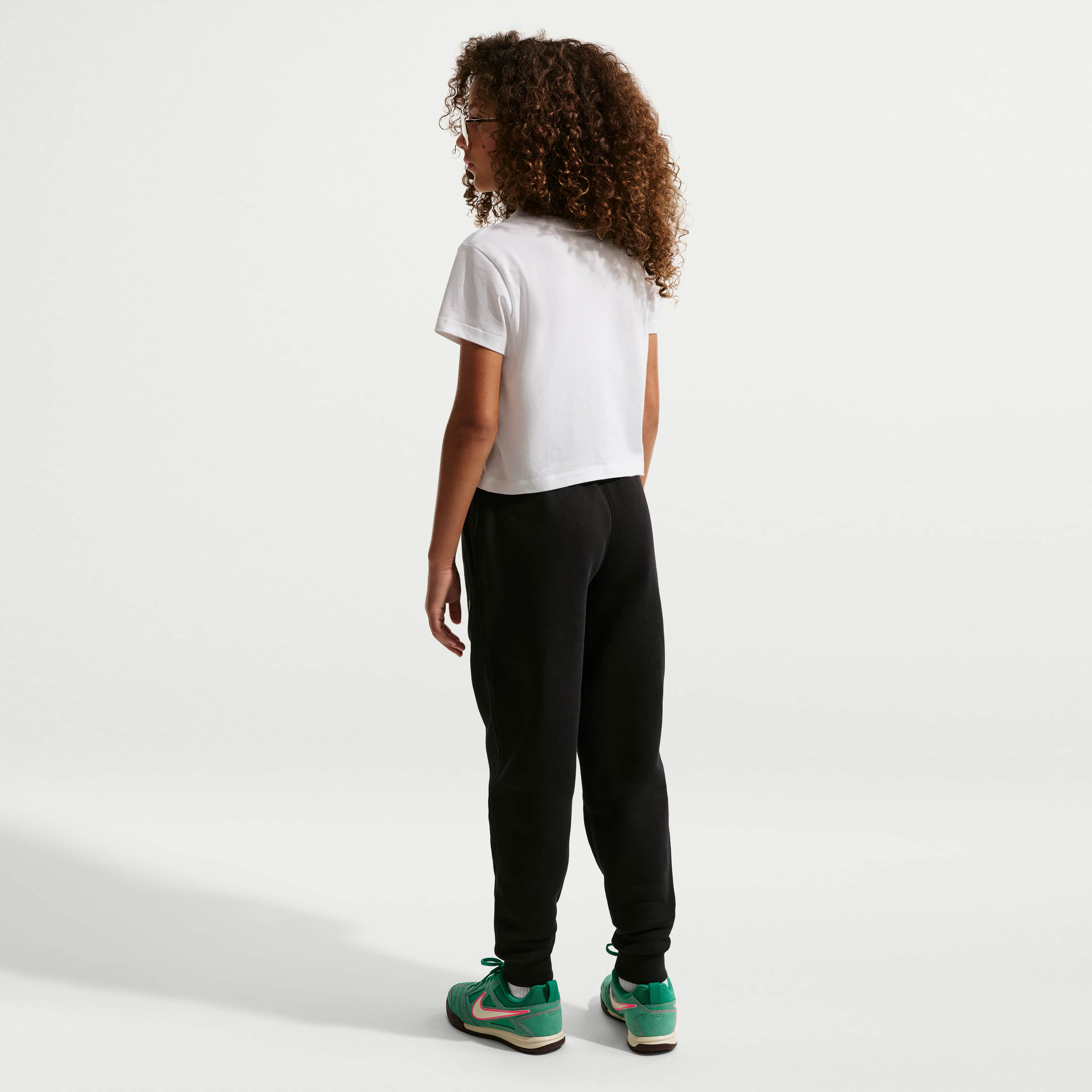 Buy Nike Sportswear Older Kids' (Girls') Cropped T-Shirt - White @ Nike UAE