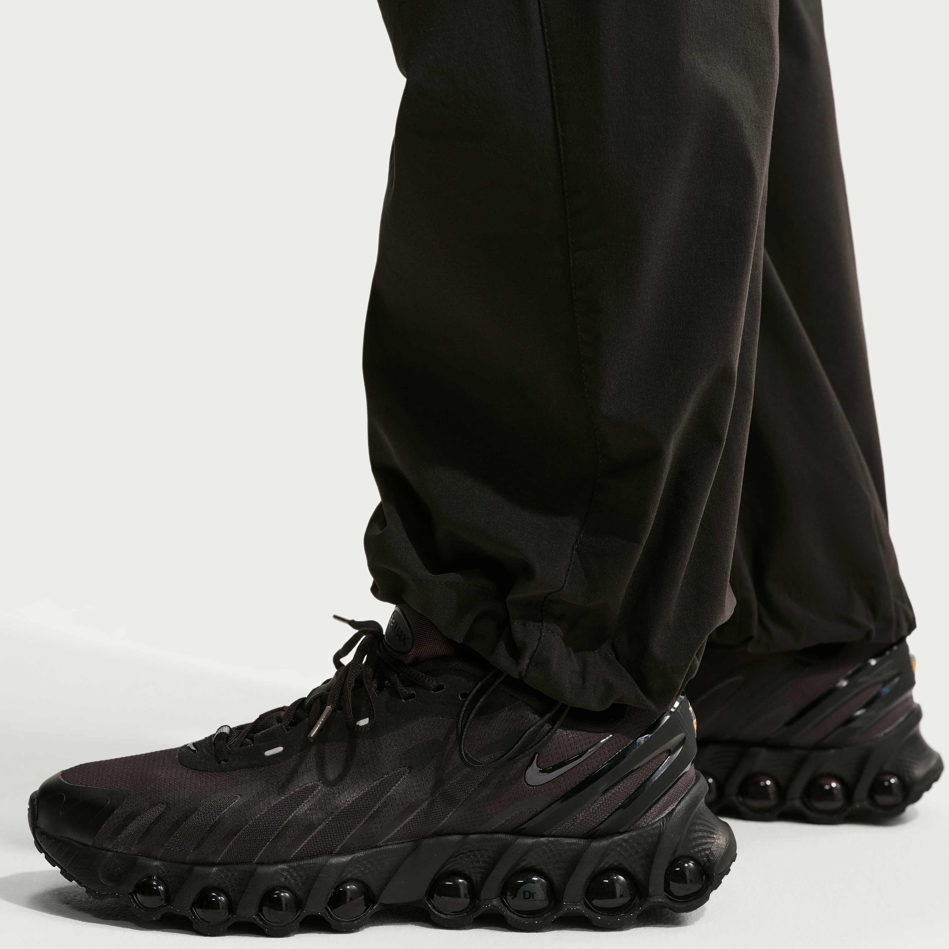Buy Nike Tech Men's Dri-FIT Woven Trousers - Black/Black/Black @ Nike UAE