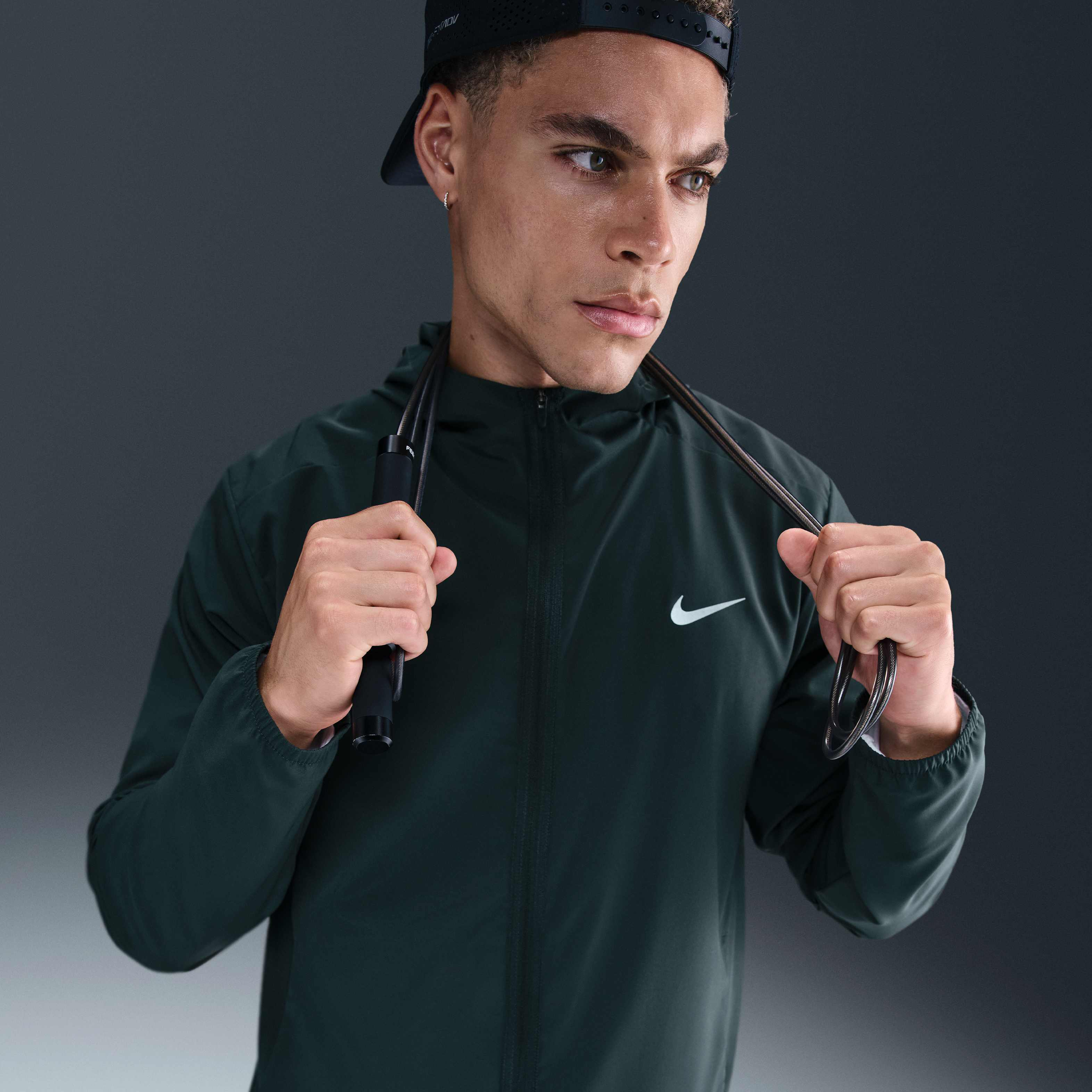 Buy Nike Form Men's Dri-FIT Hooded Versatile Jacket - Seaweed @ Nike UAE