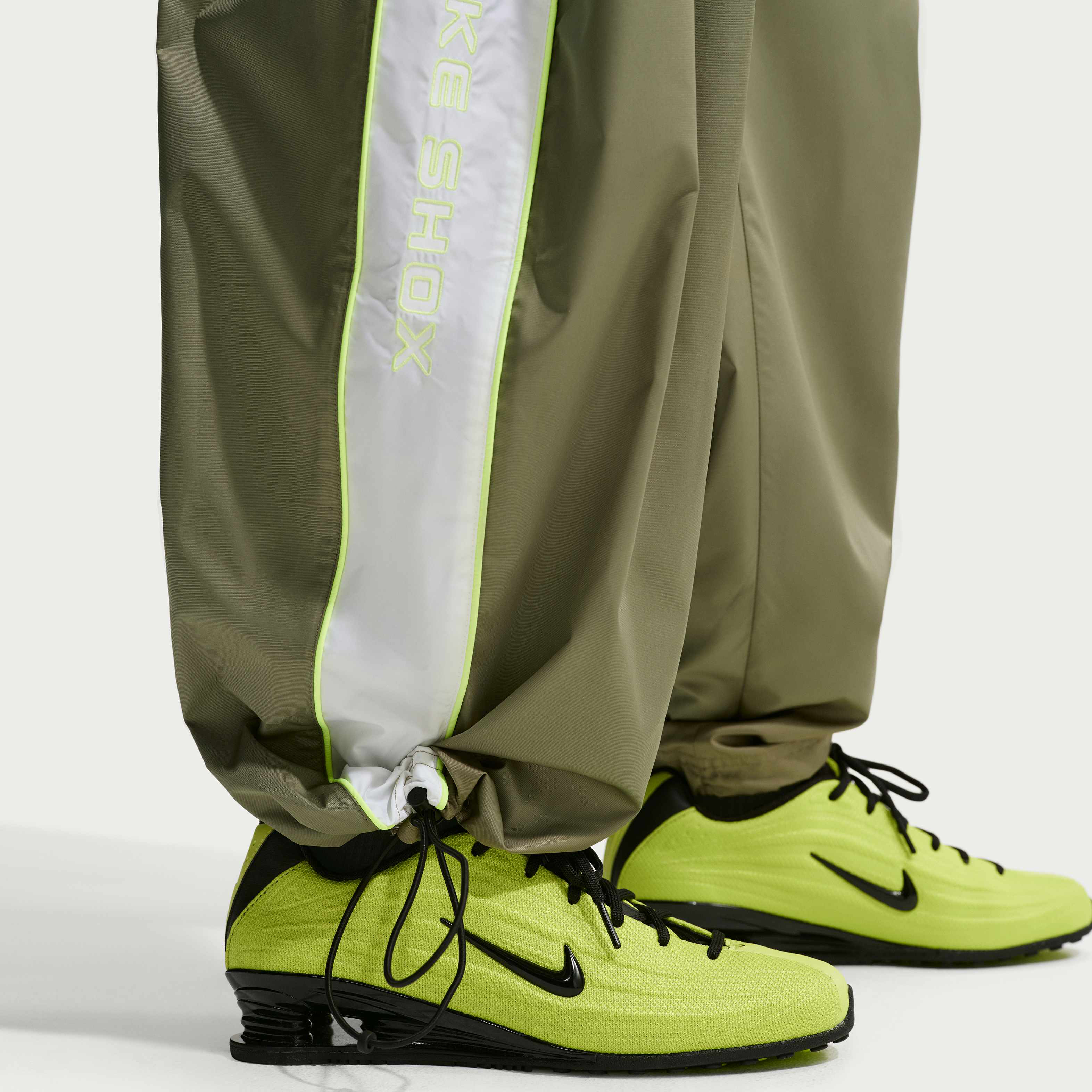 Buy Nike Sportswear Shox Women's Woven Trousers - Silver Sage/White ...