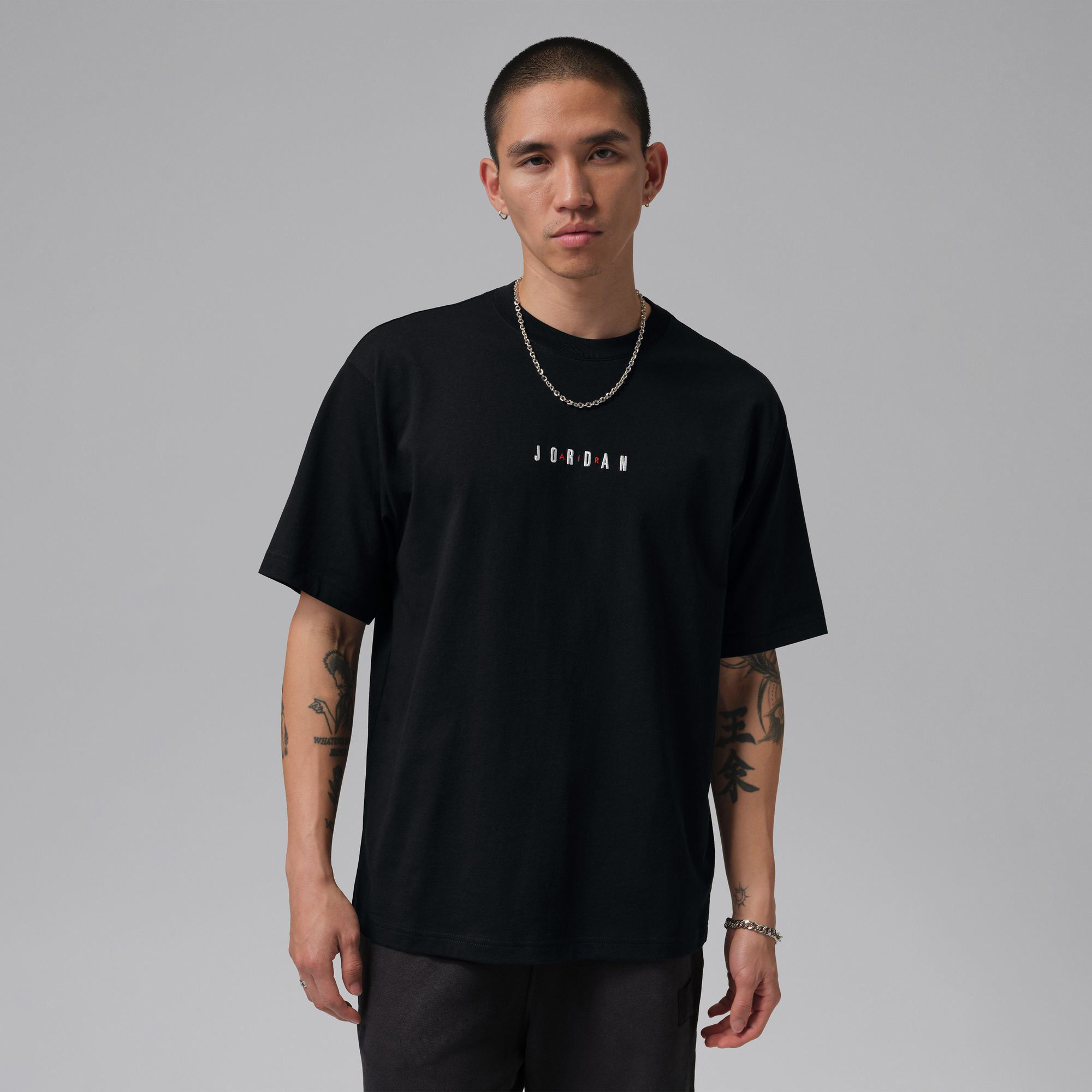 Buy Jordan Men's Embroidered T-Shirt - Black/Sail/Sail @ Nike UAE