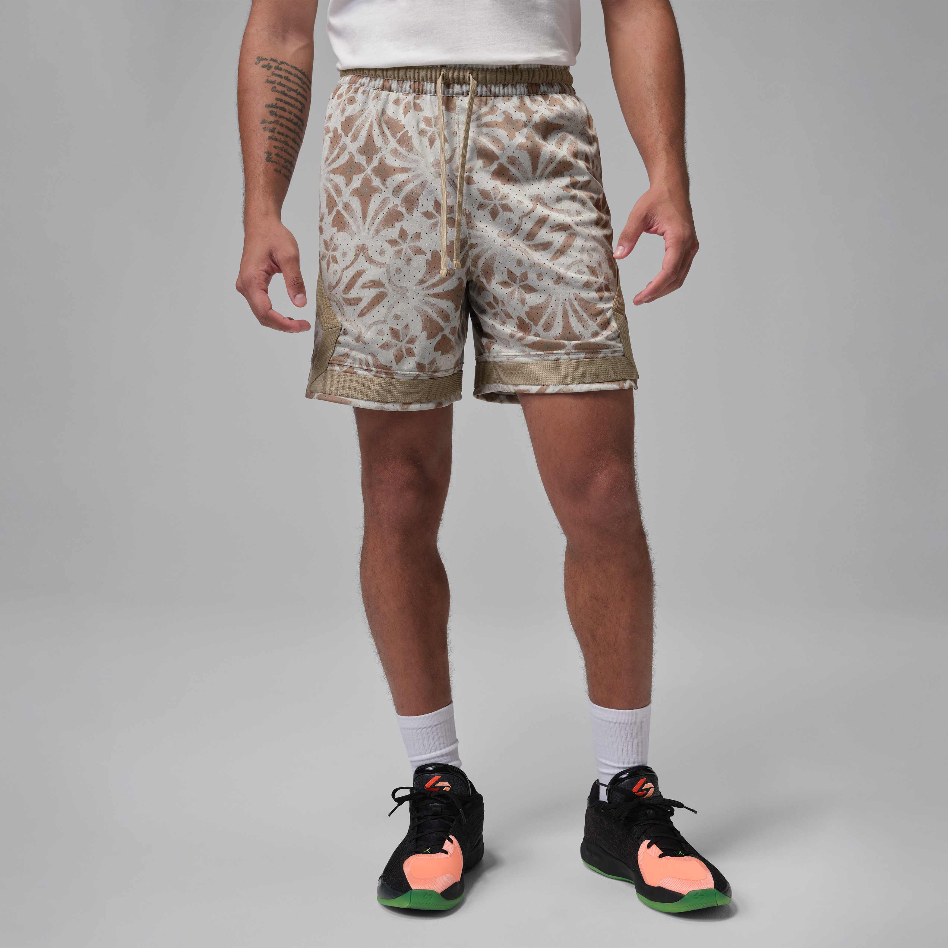 Buy Luka Dončić Men's Dri-FIT Diamond Shorts - Khaki/Varsity Red @ Nike UAE