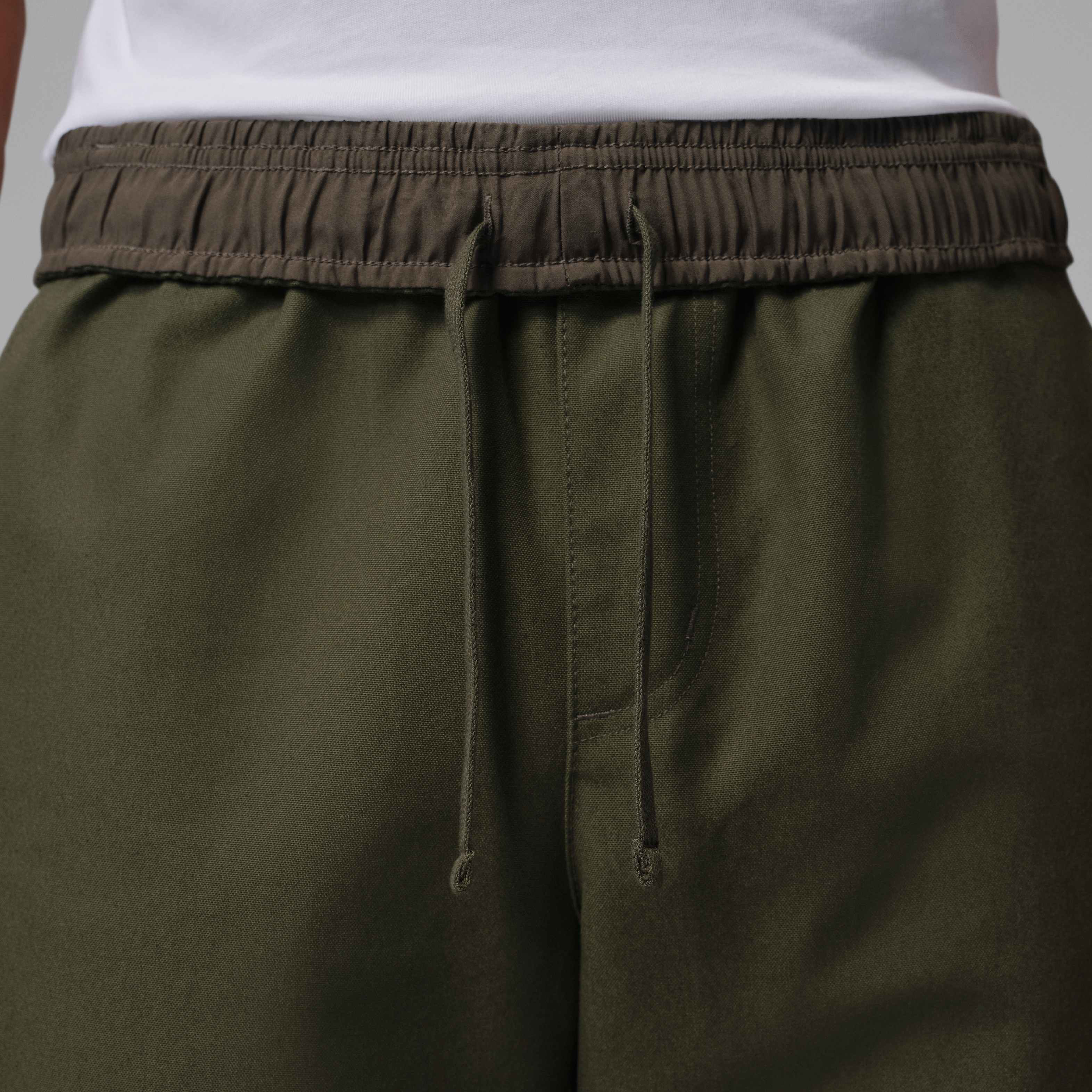 Buy Jordan Brooklyn Men's Woven Trousers - Cargo Khaki/Black @ Nike UAE