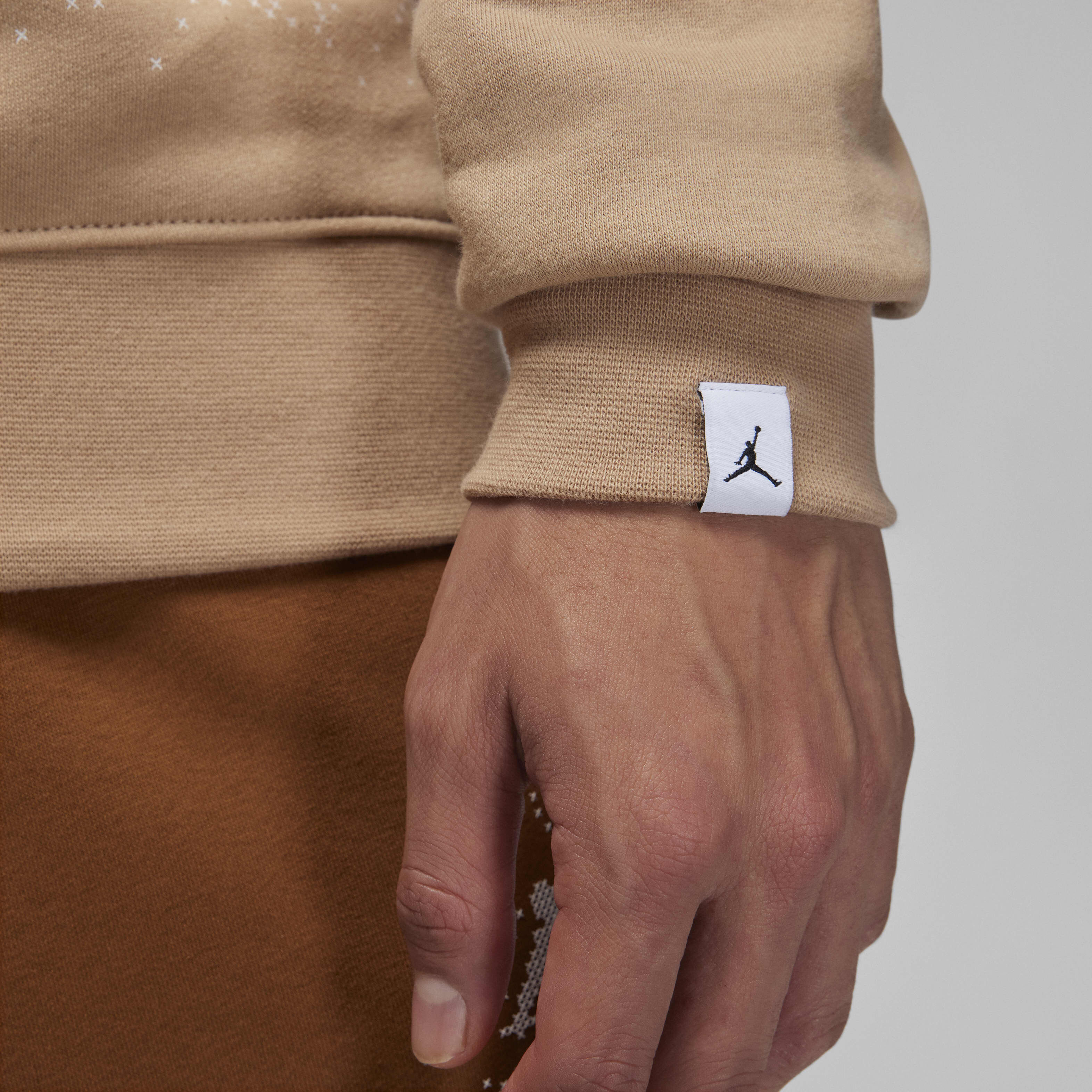Buy Jordan Essentials Festive Fleece Crew - Hemp @ Nike UAE
