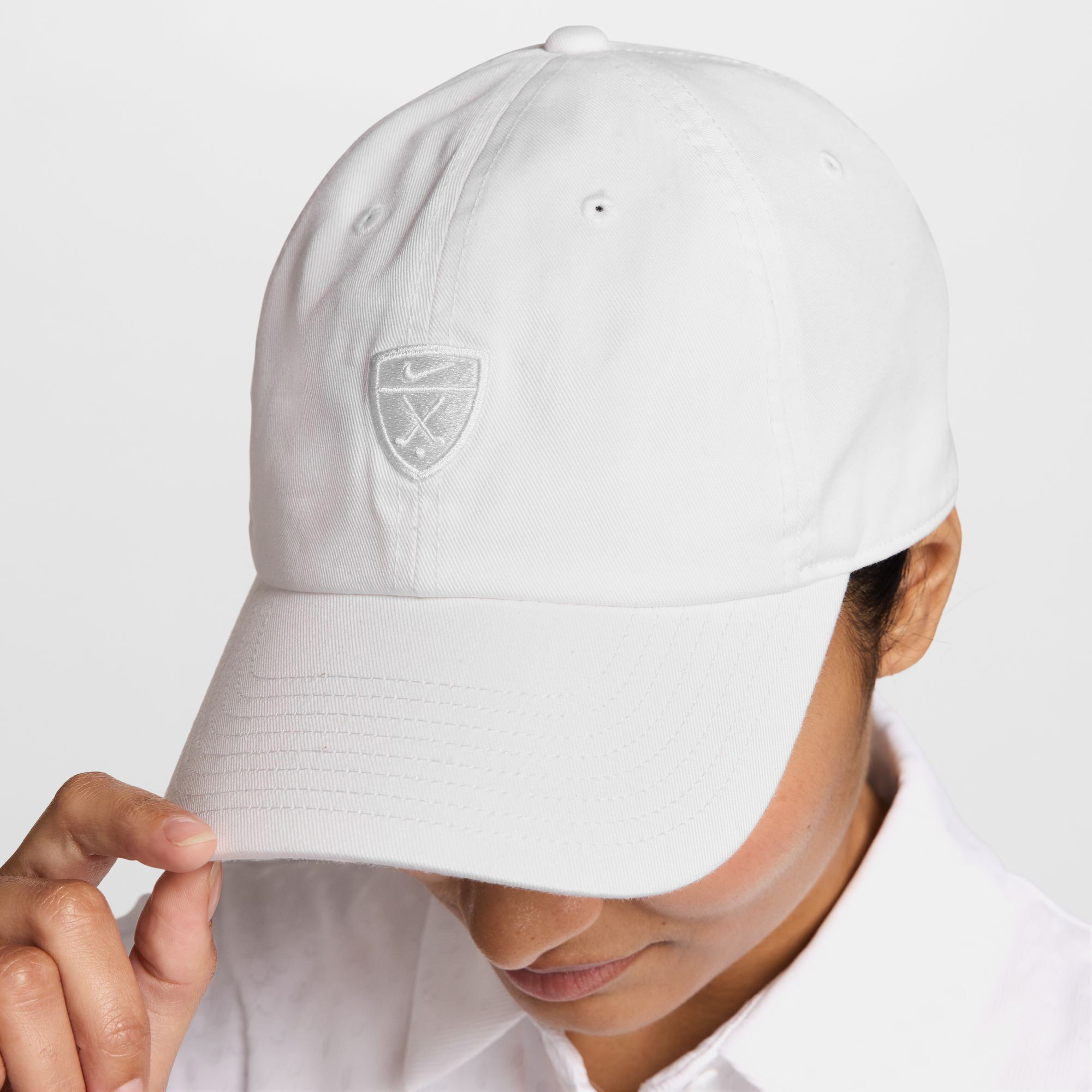 Buy Nike Club Golf Shield Unstructured Cap - White/White @ Nike UAE