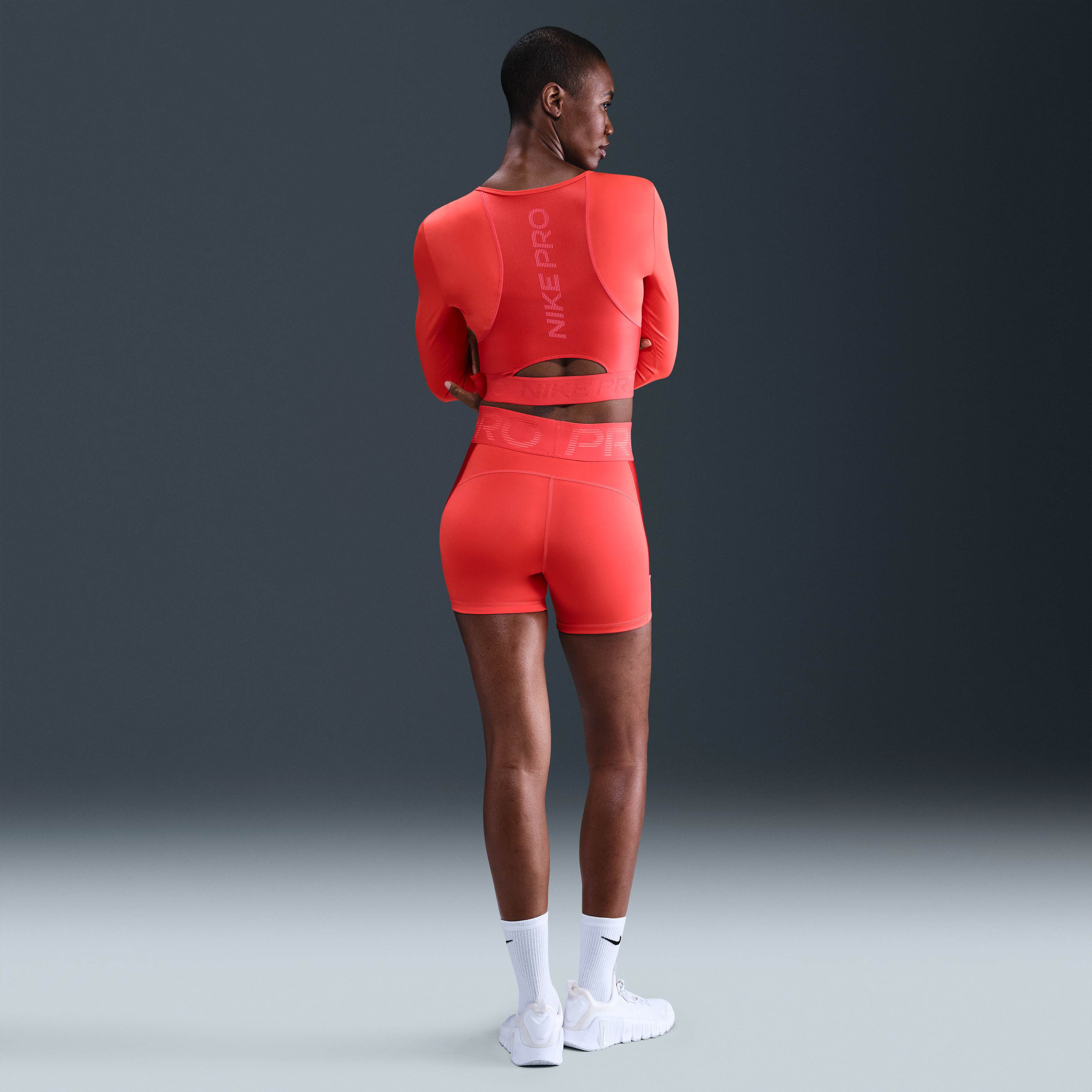 Buy Nike Pro Women's Dri-FIT Cropped Long-Sleeve Top - Light Crimson ...