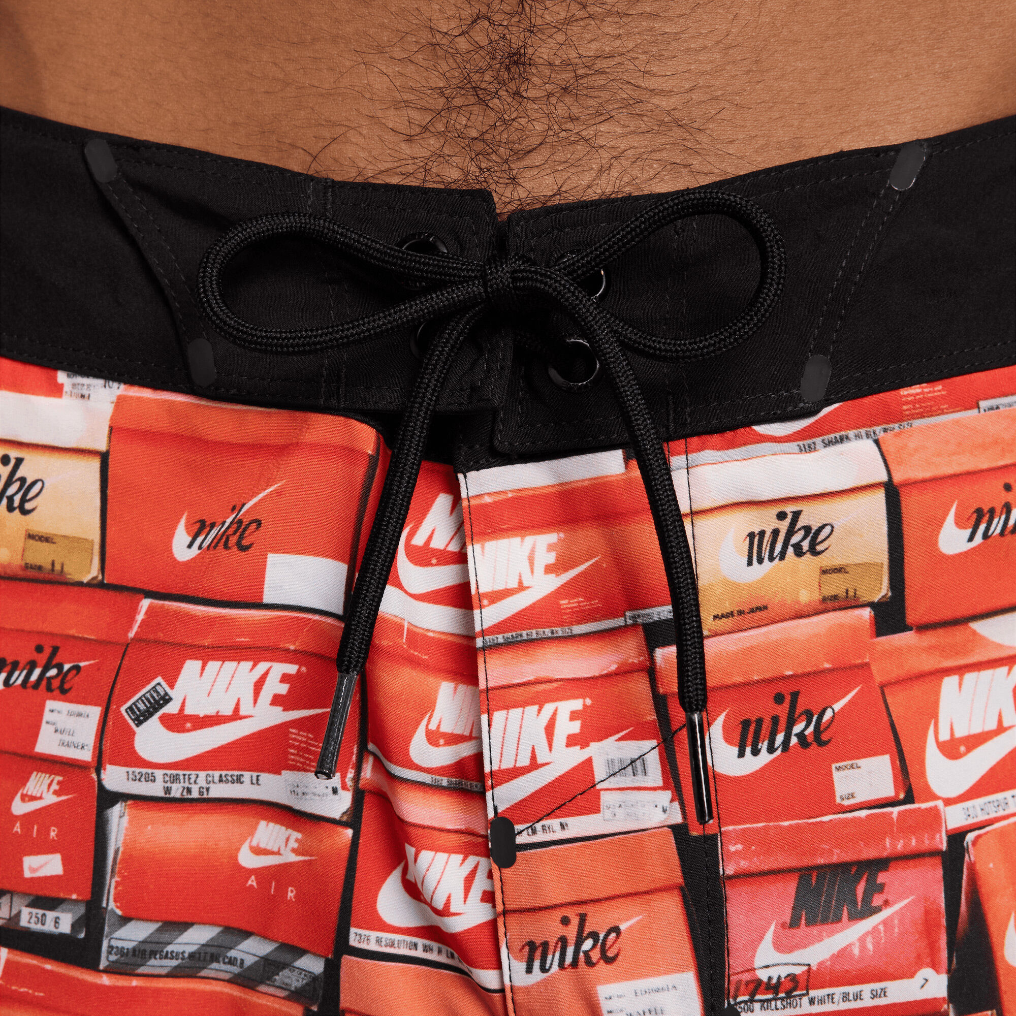 Buy Nike Men's 9" Swim Board Shorts - Orange/Black/Black @ Nike UAE