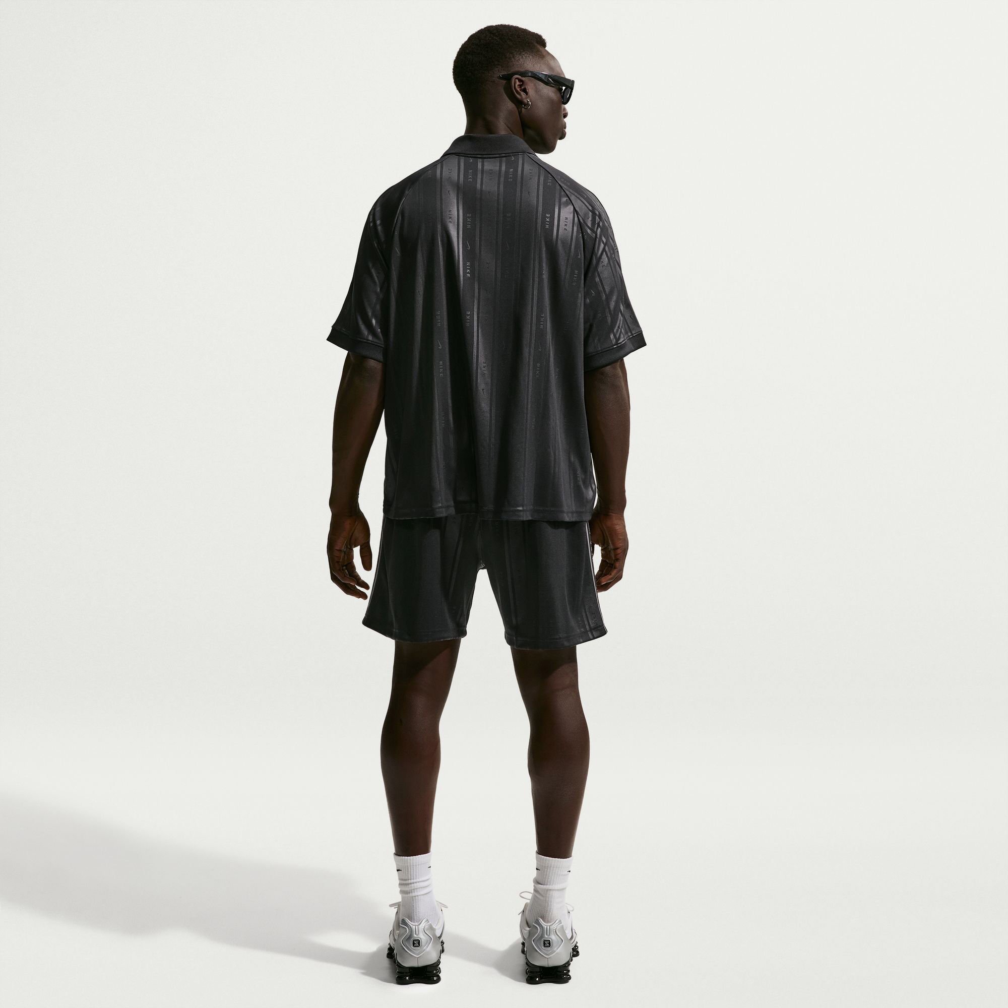 Buy Nike Sportswear City Side Men's Top - Black/Black @ Nike UAE
