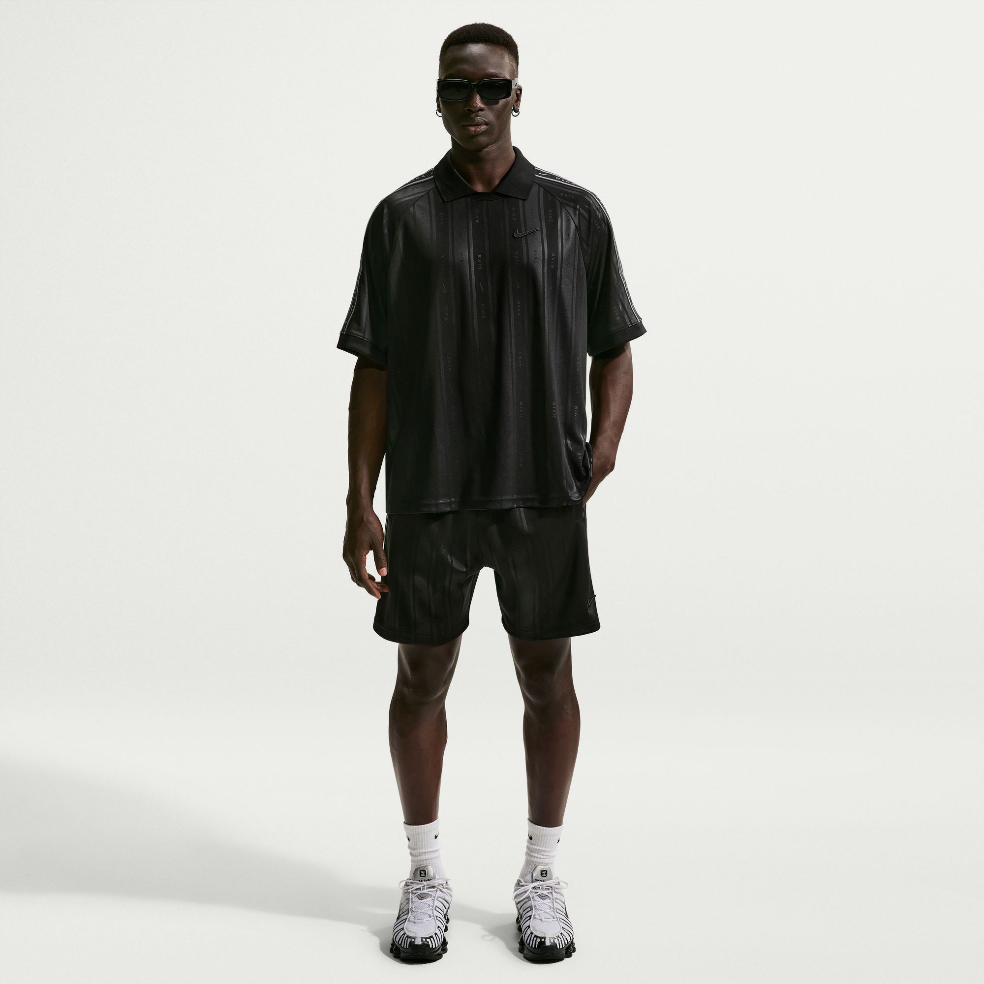 Buy Nike Sportswear City Side Men's Top - Black/Black @ Nike UAE