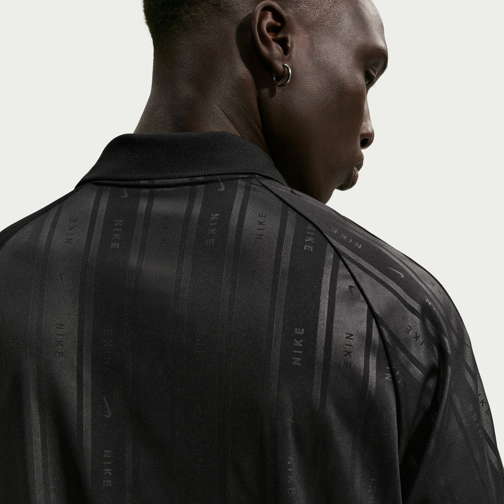 Buy Nike Sportswear City Side Men's Top - Black/Black @ Nike UAE