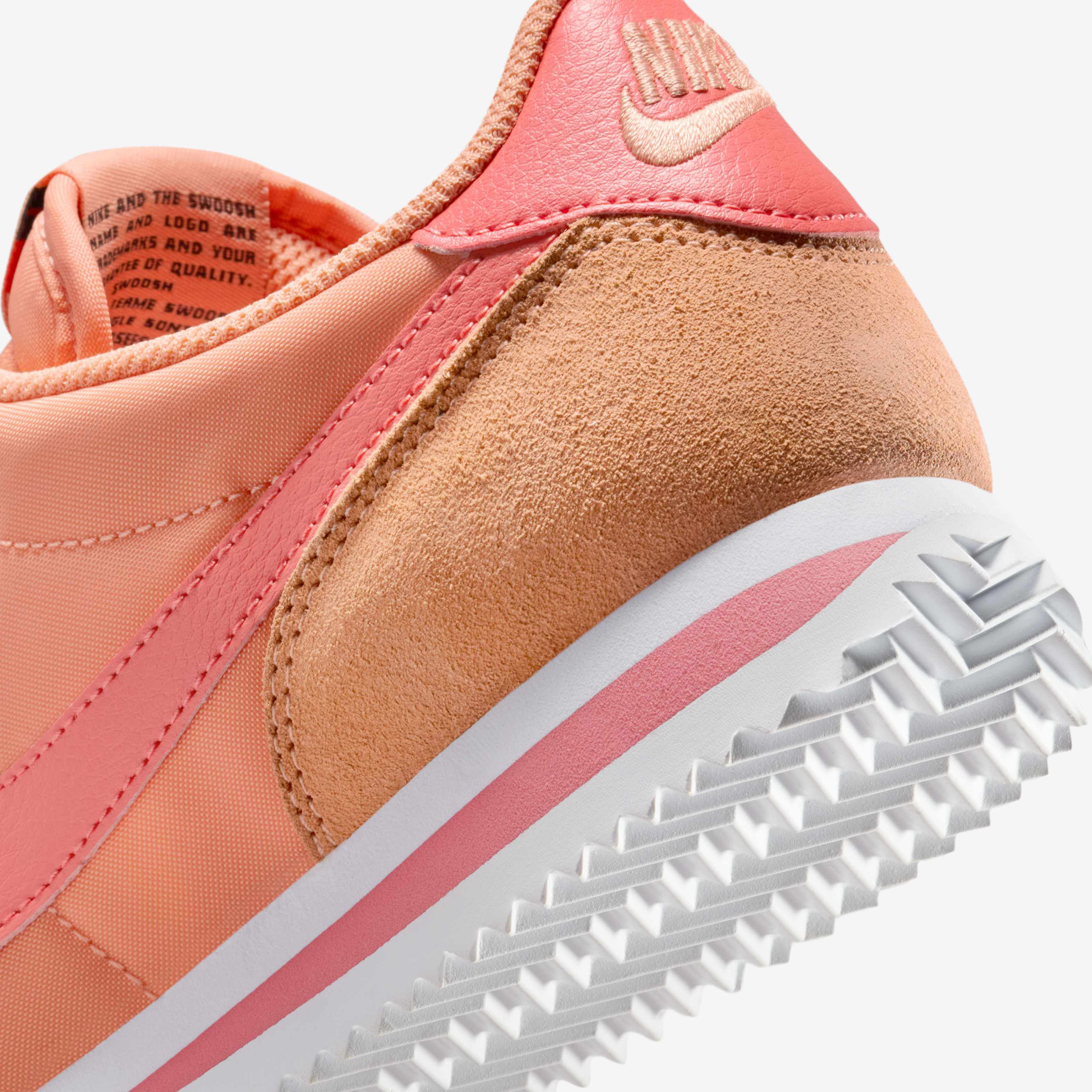 Buy Nike Cortez Textile Shoes - Apricot Agate/White/Safety Orange/Magic Ember | Nike UAE Official
