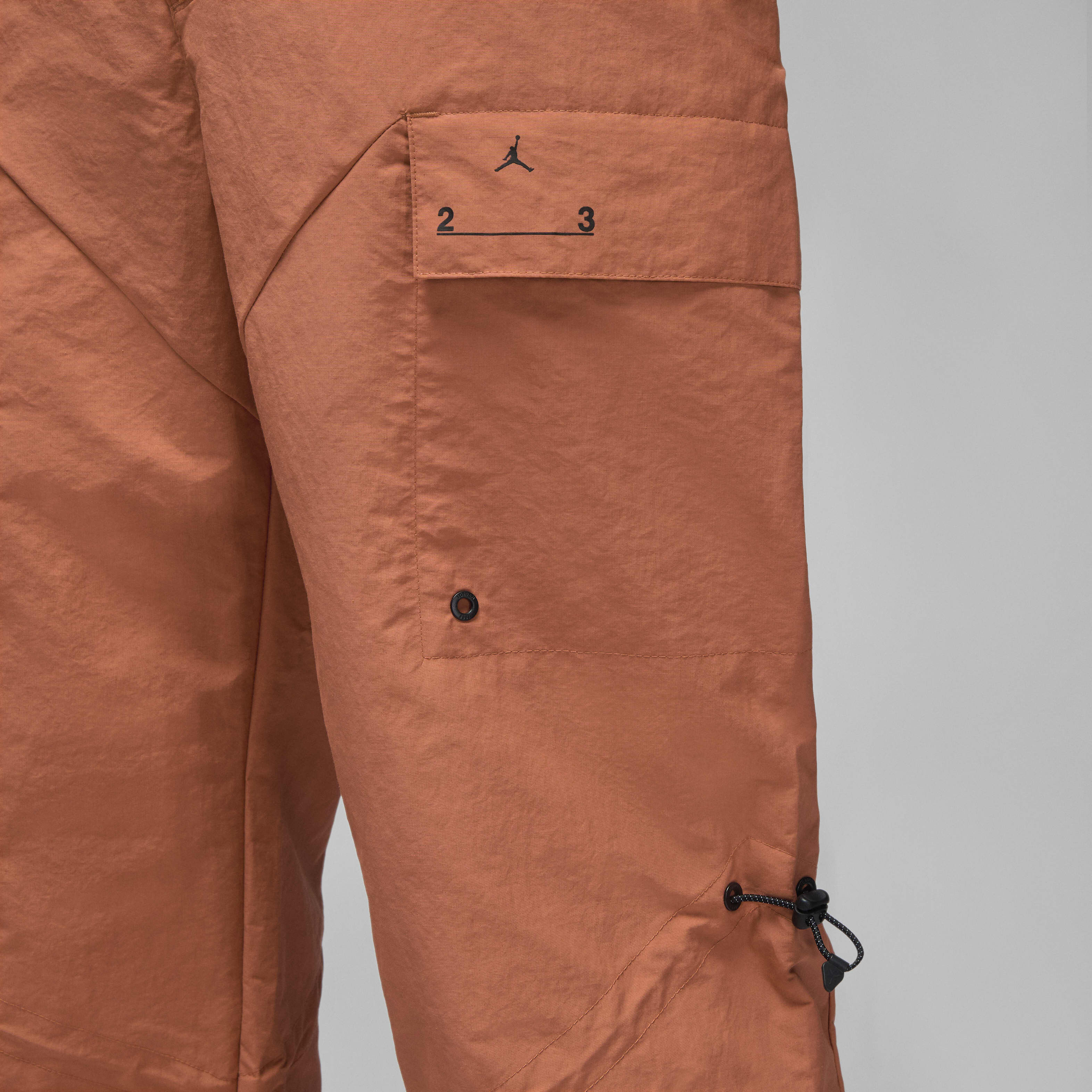 Buy Jordan 23 Engineered Men's Woven Trousers - Rust Oxide | Nike UAE ...