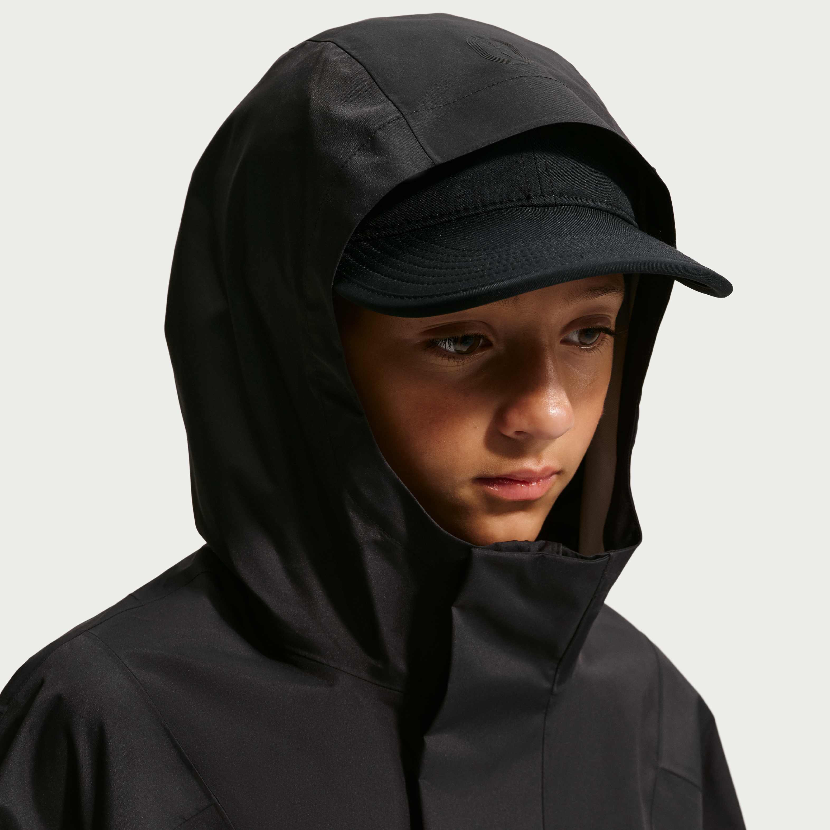 Buy Nike MAVN Girls' Storm-FIT ADV Rain Jacket - Black/Black @ Nike UAE
