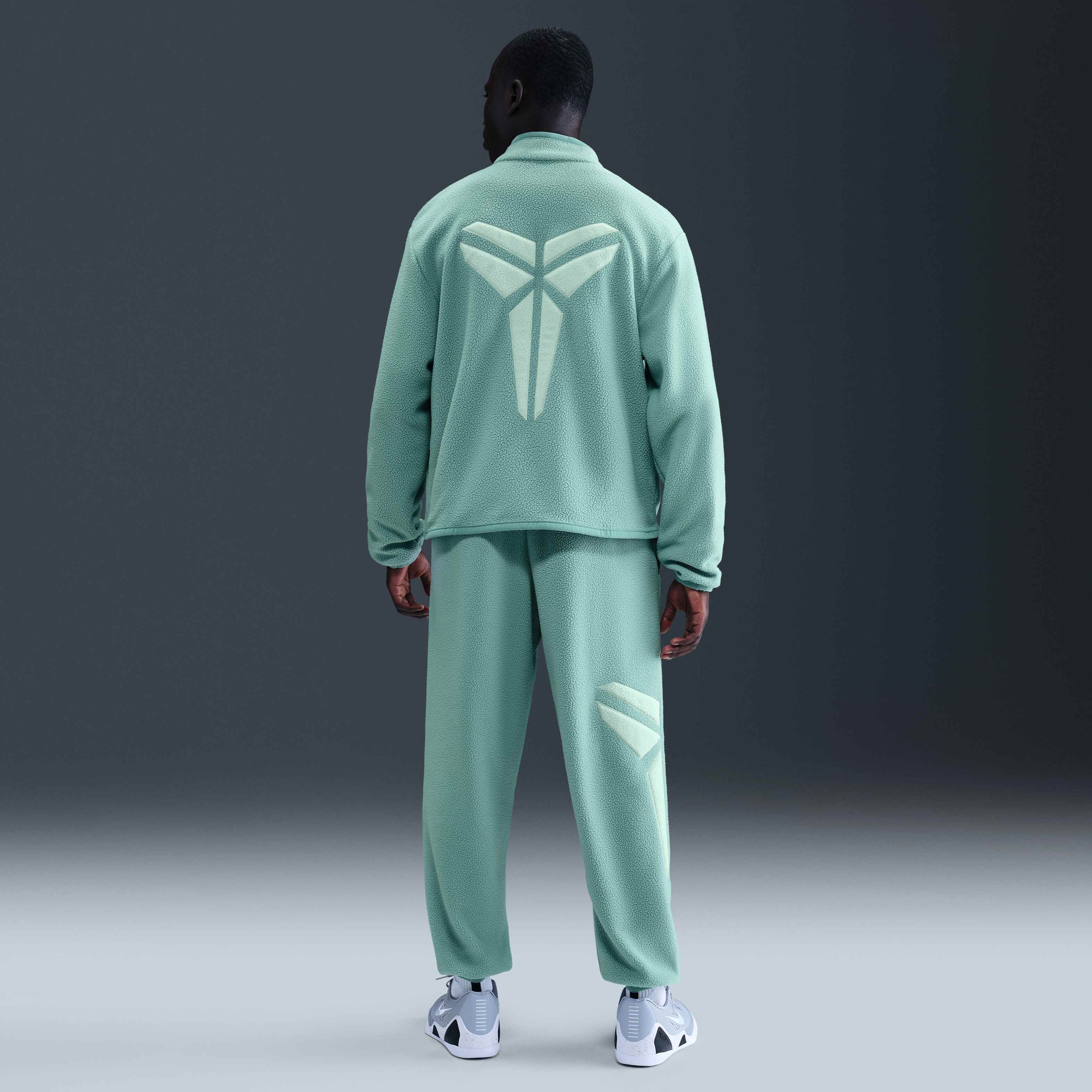 Buy Kobe Men's Winterized Trousers - Cannon/Light Silver/White @ Nike UAE