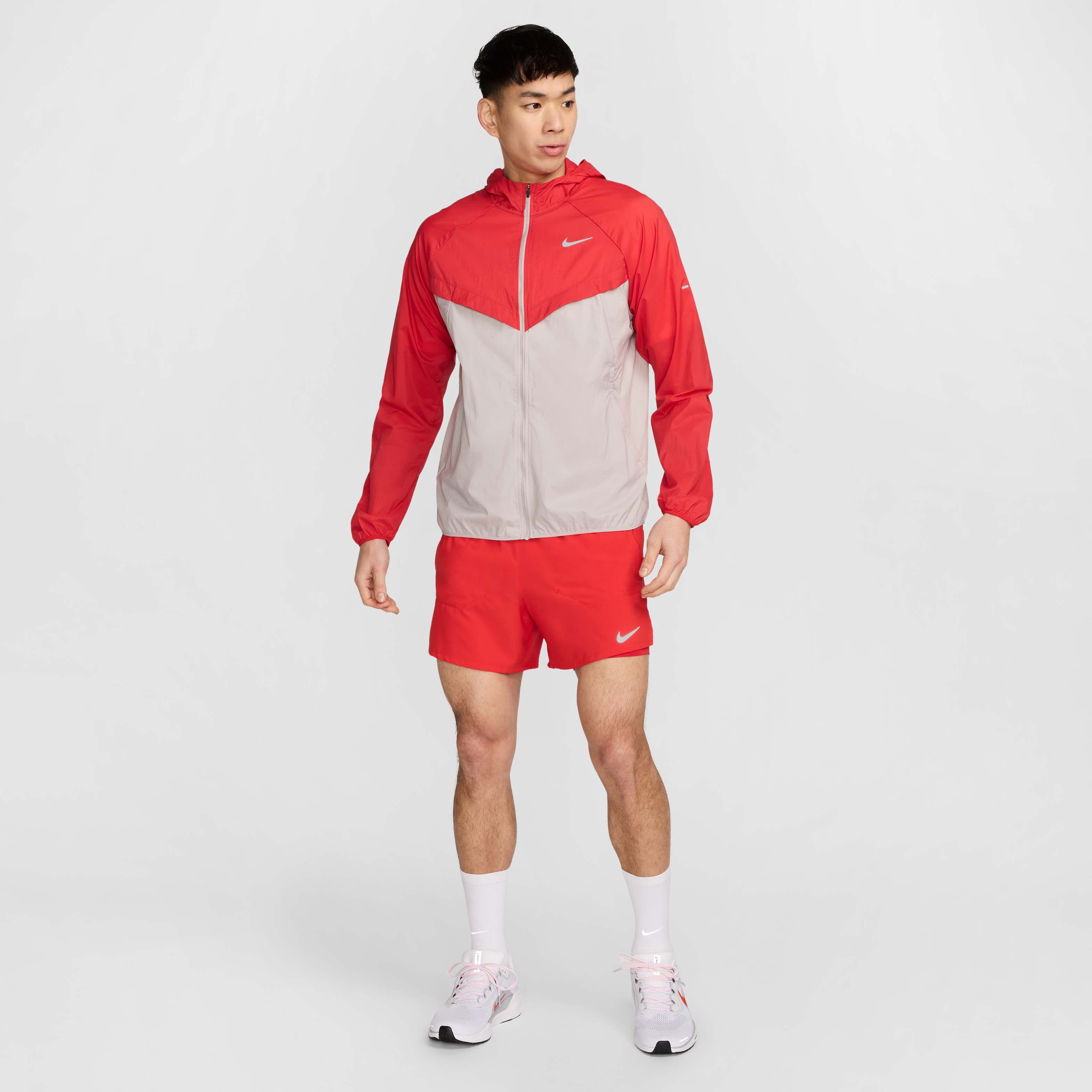 Buy Nike Stride Men's Repel UV Running Jacket - University Red/College ...