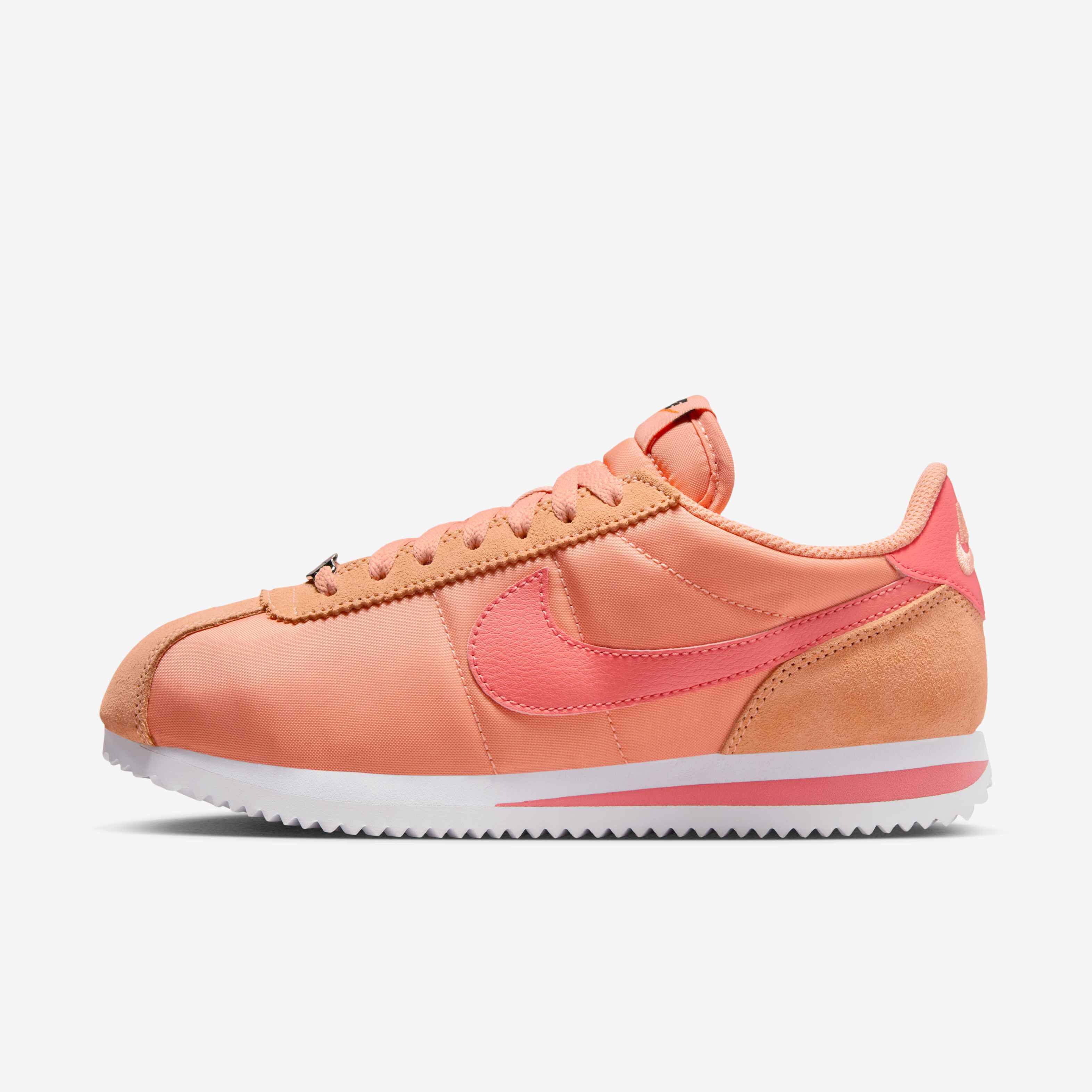 Buy Nike Cortez Textile Shoes - Apricot Agate/White/Safety Orange/Magic Ember | Nike UAE Official