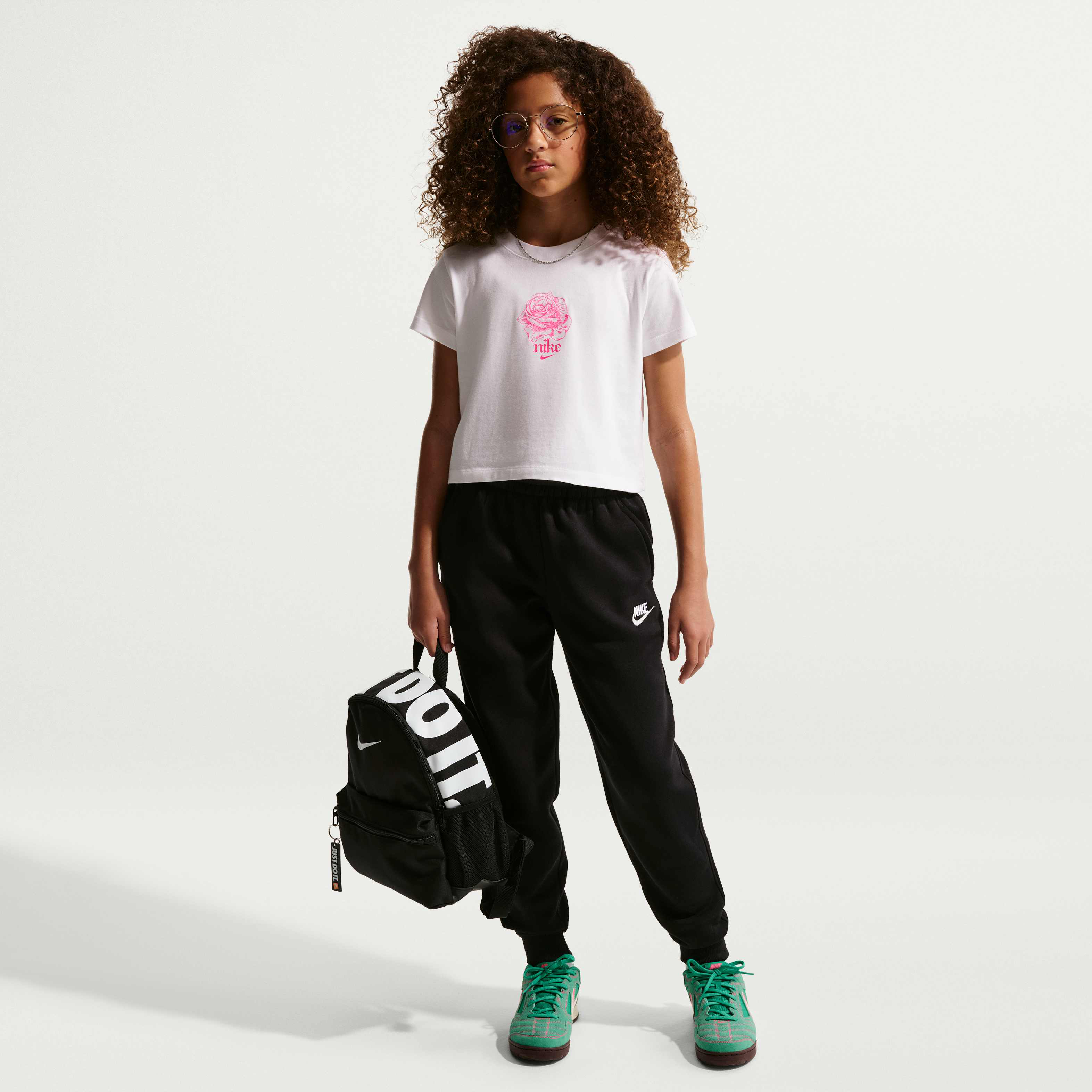 Buy Nike Sportswear Older Kids' (Girls') Cropped T-Shirt - White @ Nike UAE
